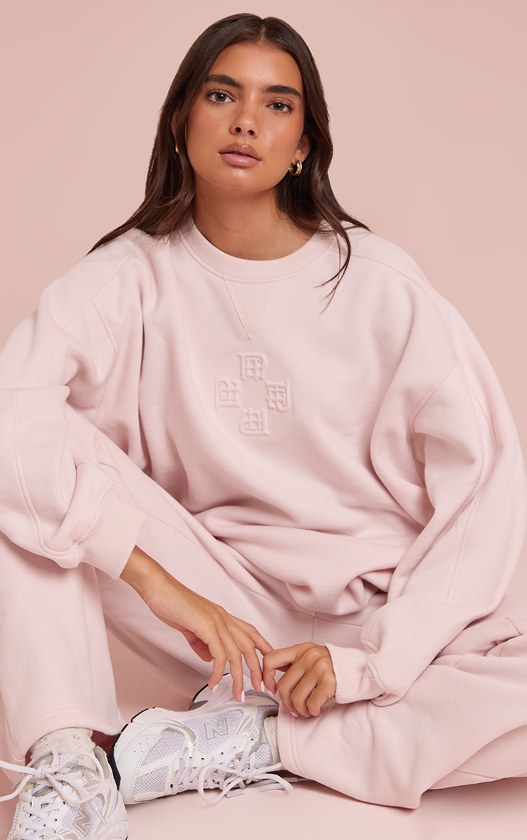 Baby Pink PLT Embossed Crew Neck Sweatshirt | Athleisure | PLT USA