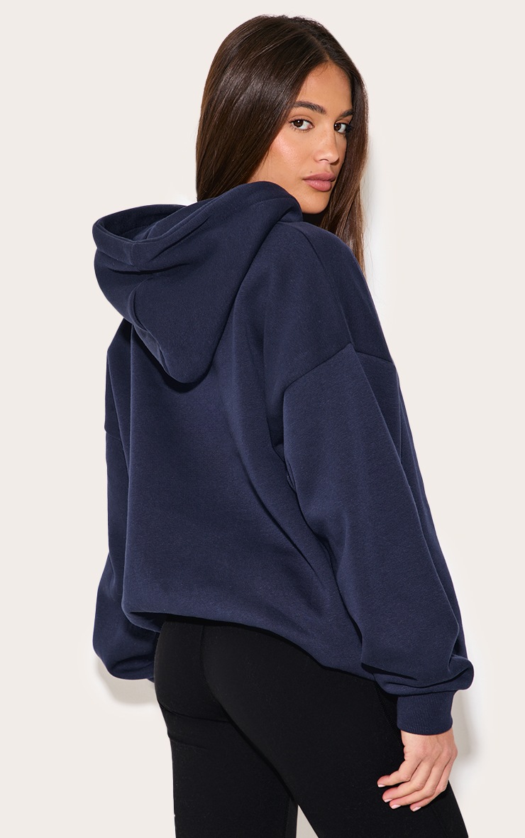 PLT Navy Contrasting Print Logo Oversized Hoodie | Athleisure | PrettyLittleThing USA