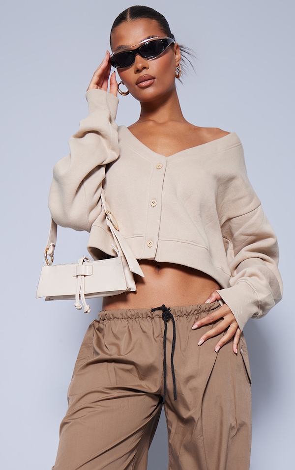 Stone Button Front Crop Sweatshirt | Tops | PrettyLittleThing USA