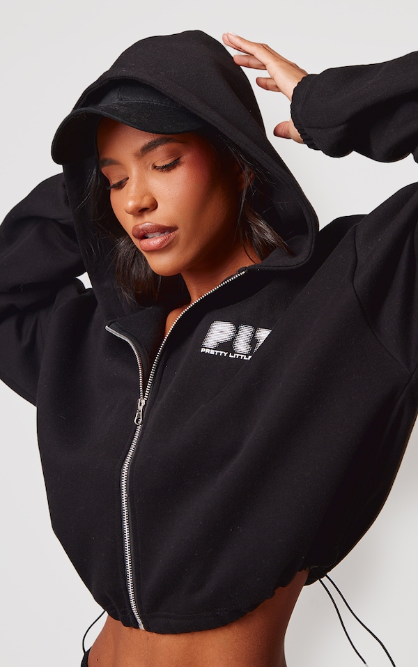 PLT Black Elasticated Hem Zip Up Hoodie | Sweat | PrettyLittleThing USA