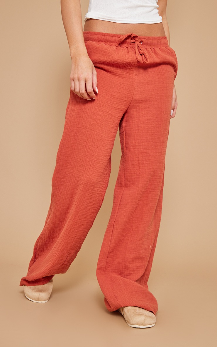 Rust Textured Cheesecloth Drawstring Waist Trousers | PrettyLittleThing