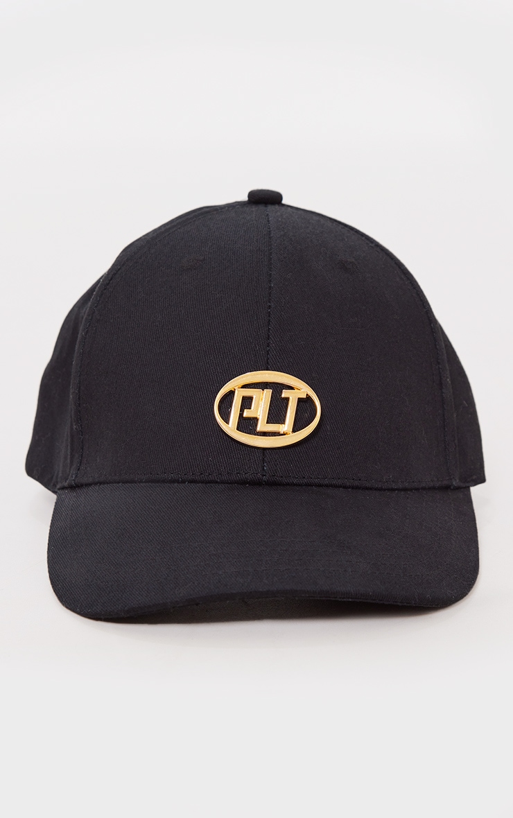 Prettylittlething Black Oval Metal Badge Cap | PrettyLittleThing