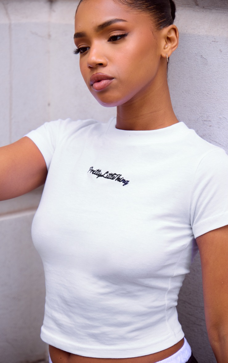 PLT White Plt Embroidered Baby Doll Tee | Tops | PrettyLittleThing USA