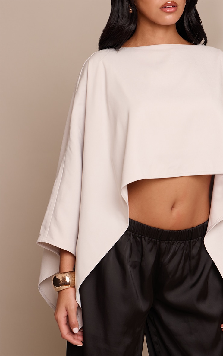 Cream Woven Cape Style Top | Tops | PLT CA