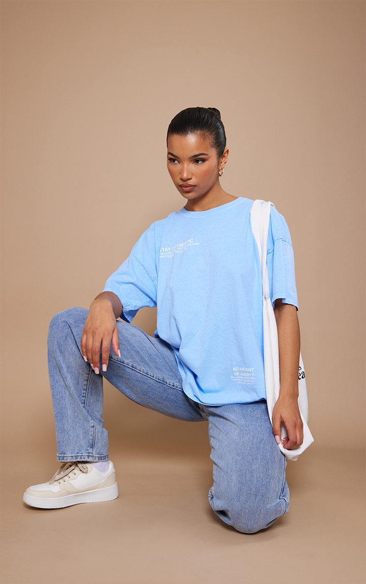Blue Stay Optimistic Small Slogan Washed T Shirt | Tops | PLT