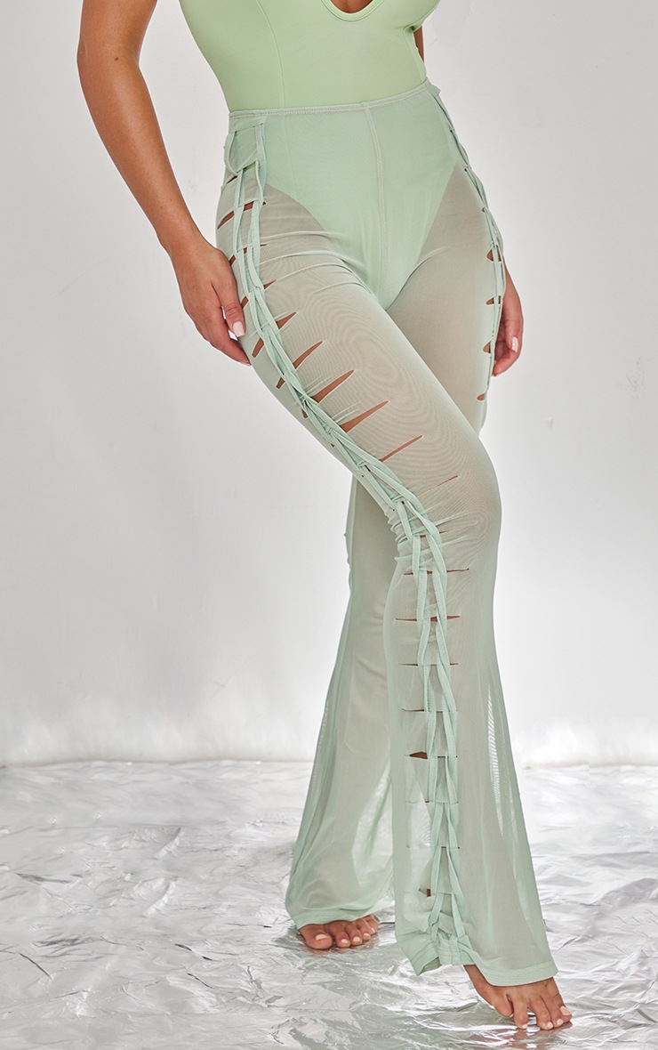 Sage Green Sheer Macrame Beach Flares | PrettyLittleThing