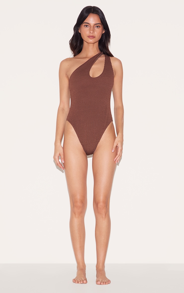 Chocolate Brown Crinkle One Shoulder Cut Out Swimsuit | Swimwear | PrettyLittleThing USA