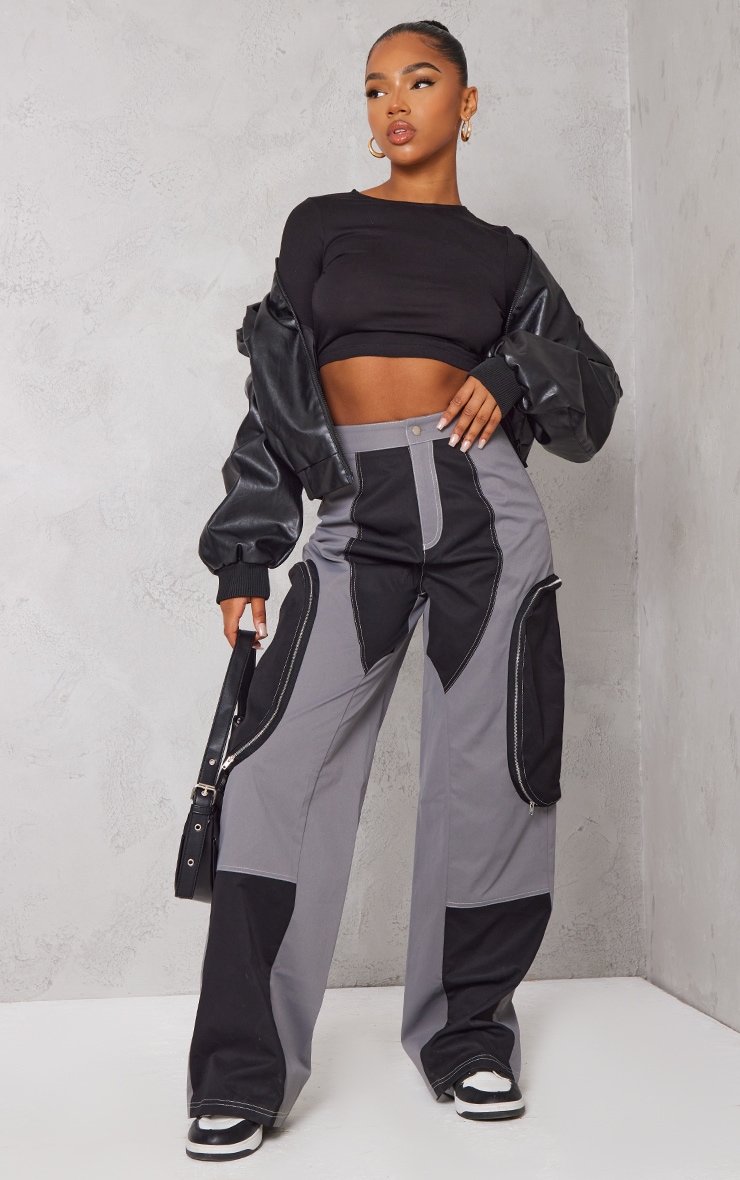 Crop top noir à manches longues et lien à nouer dos | PrettyLittleThing FR