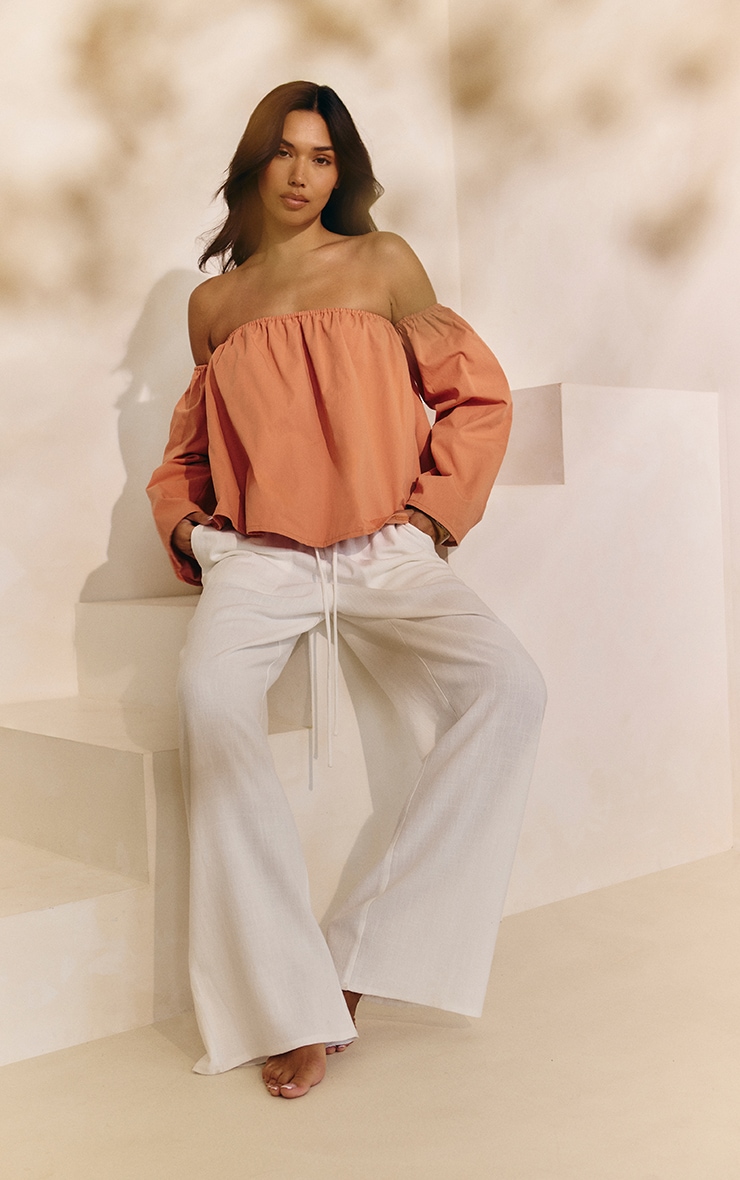Apricot Peach Skin Floaty Bardot Top | Tops | PLT