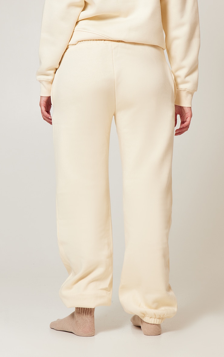Cream Monaco Sports Embroidered Cuffed Sweatpants | Sweat ...