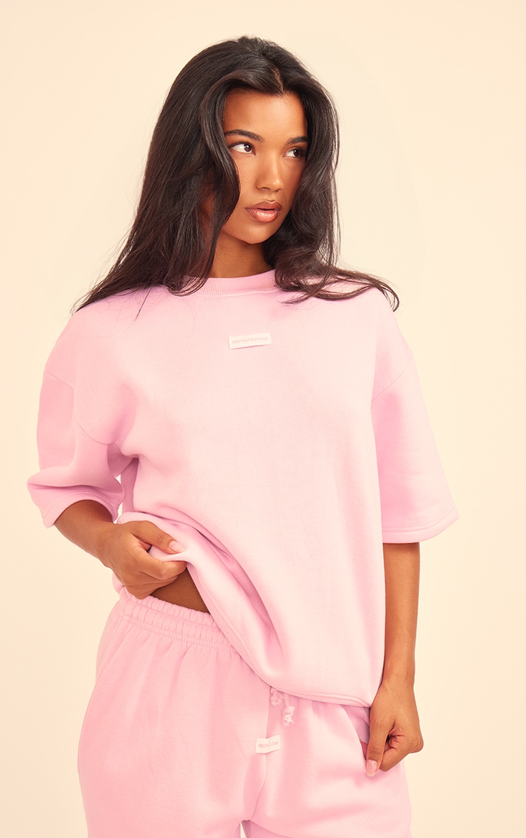 PLT Baby Pink Badge Mid Rise Wide Leg Joggers | Athleisure | PLT