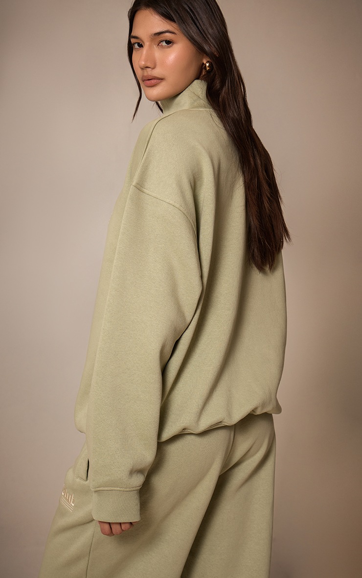 Sage Embroidered Half Zip Sweatshirt | Athleisure | PrettyLittleThing USA