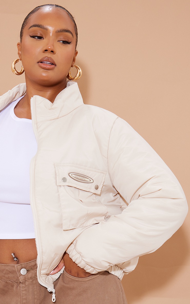 Plt Plus Stone Badge Utility Pocket Puffer | PrettyLittleThing