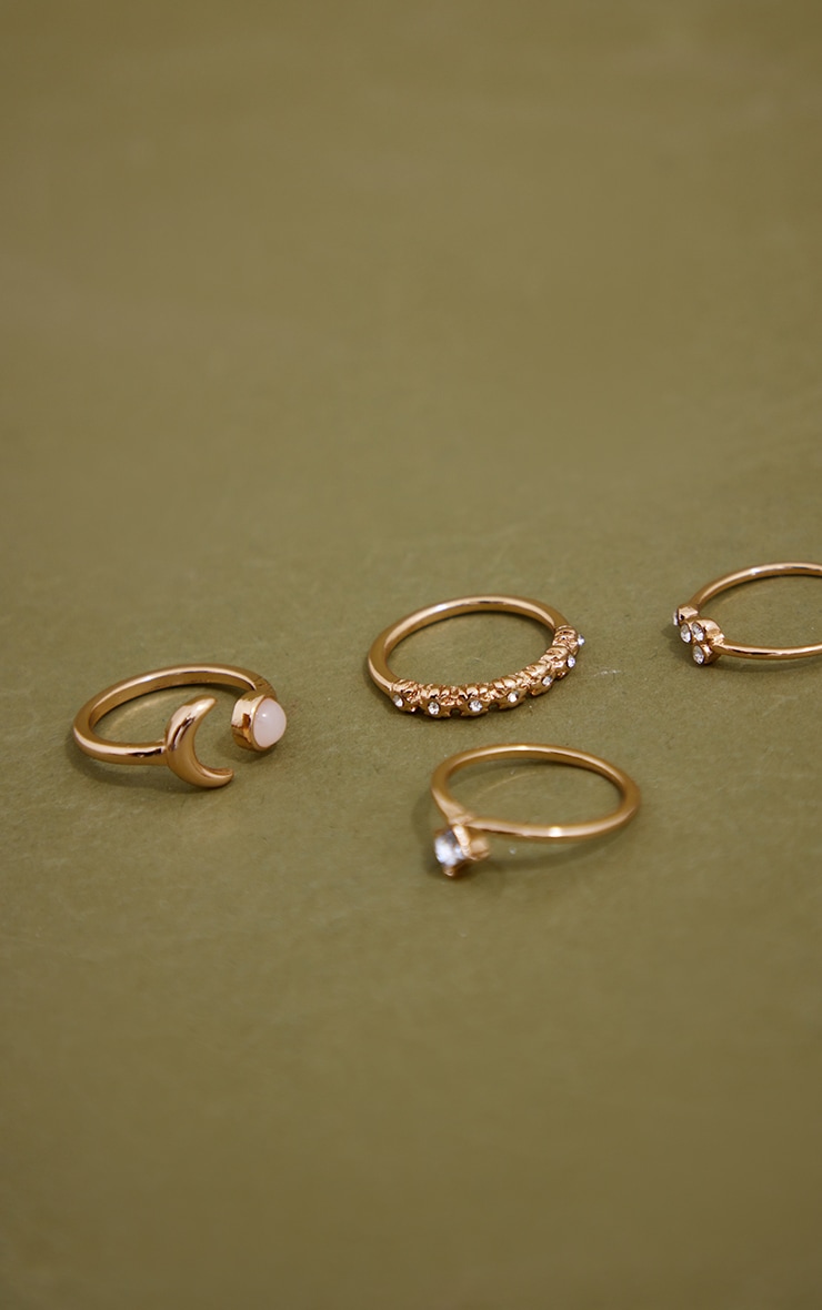 Gold Assorted Celestial 4 Pack Ring Set | PrettyLittleThing