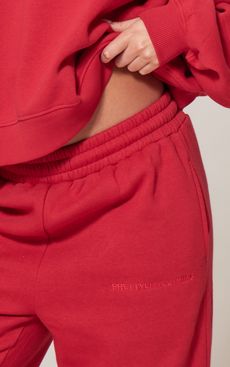 PLT Red Oversized Embroidered Cuffed Joggers | Athleisure | PLT