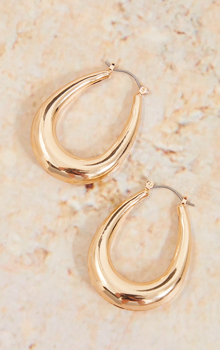 Gold Rounded Oval Hoop Earrings | PrettyLittleThing USA