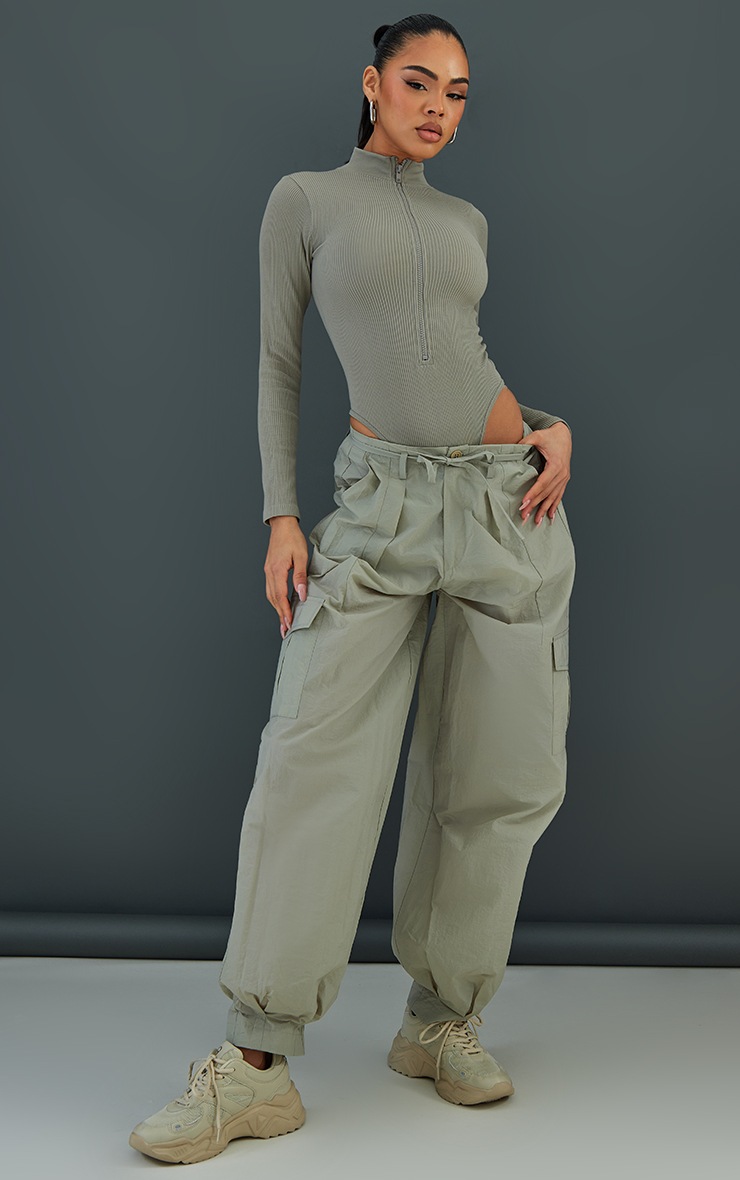 Moss Grey Contour Rib Zip Up Long Sleeve Bodysuit | PrettyLittleThing AUS