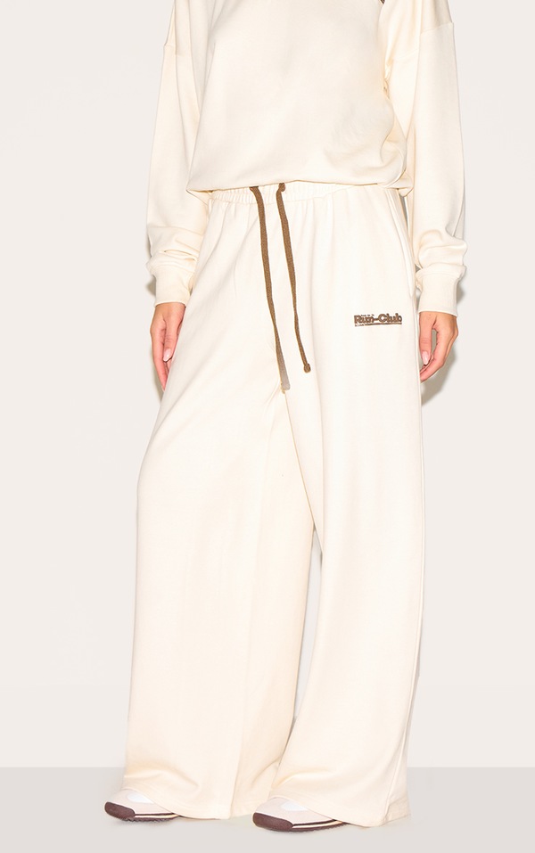 Cream Run Club Puff Print Wide Leg Track Pants | Athleisure | PLT AUS