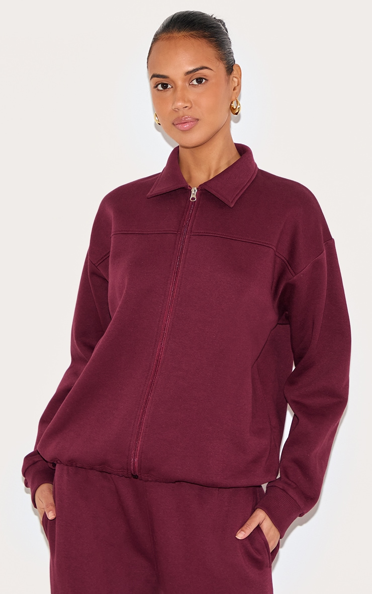 Burgundy Zip Though Collared Sweatshirt | Athleisure | PrettyLittleThing AUS