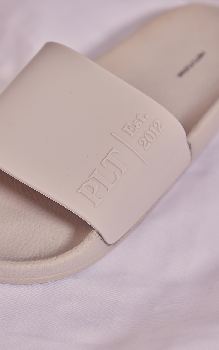 Cream Rubber Round Toe Plt Embossed Sliders | PrettyLittleThing