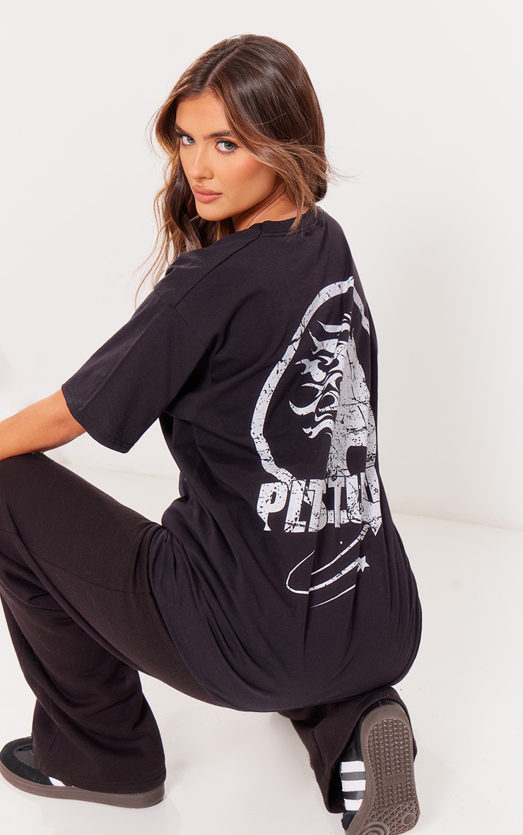 PRETTYLITTLETHING Black Sporty Print T Shirt | Tops | PrettyLittleThing KSA