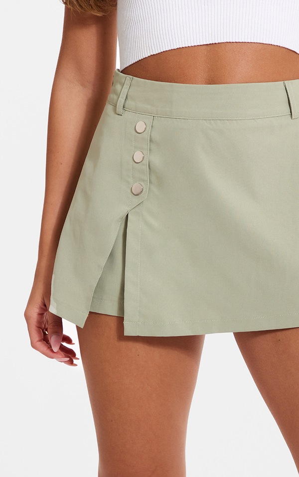 Sage Green Woven Button Detail Mini Skort | Bottoms | PrettyLittleThing AUS