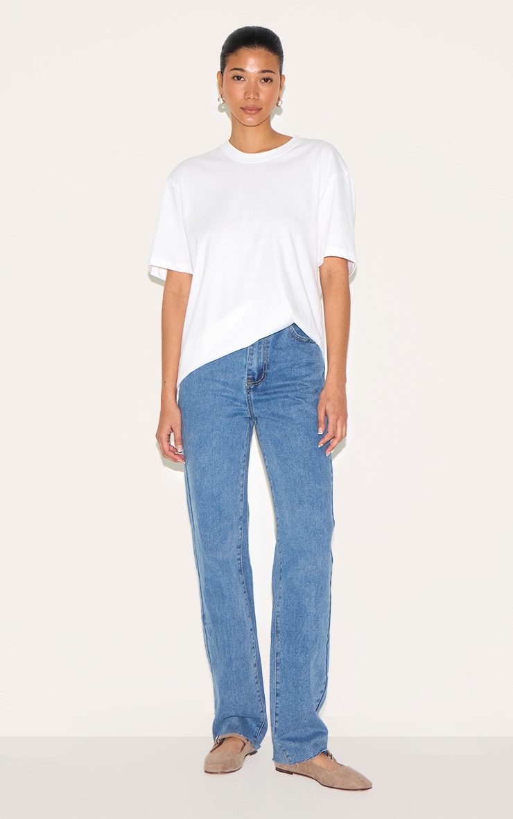 Mid Blue Wash Raw Hem Straight Leg Jean | Denim | PrettyLittleThing USA