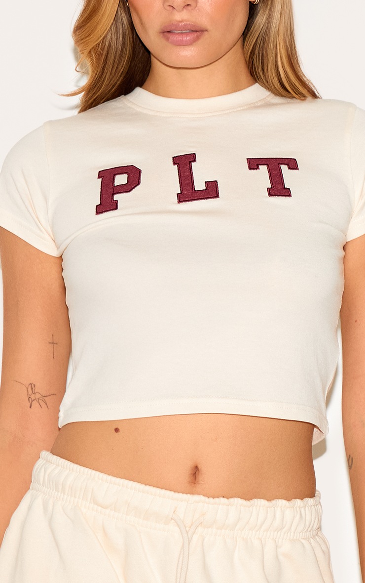 PRETTYLITTLETHING Cream Fitted Cropped T Shirt | Athleisure | PLT