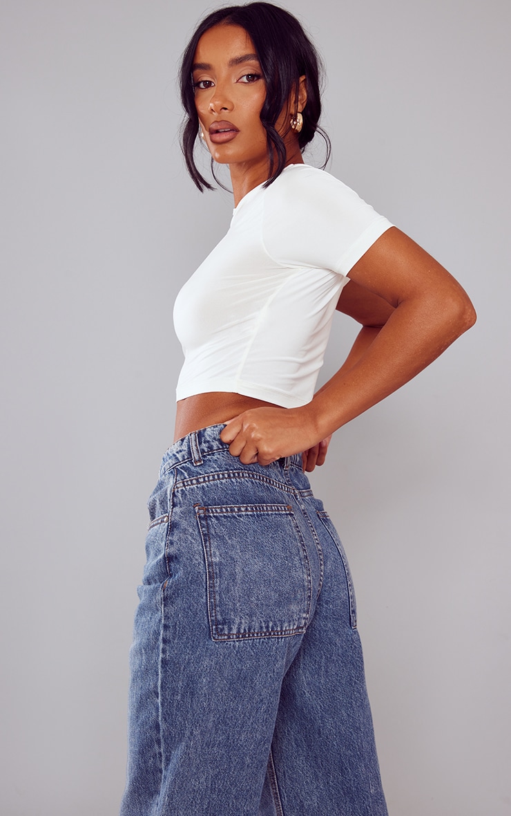 Cream Slinky Short Sleeve Crop Top | Tops | PrettyLittleThing